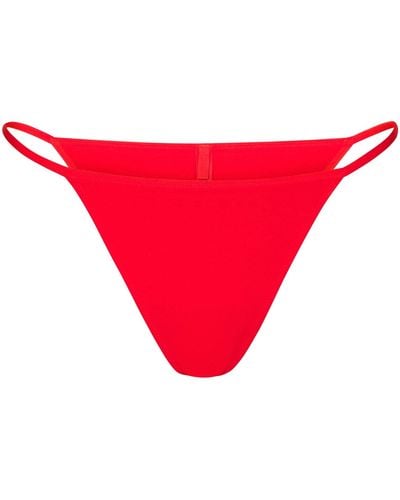 Red Skims Beachwear and swimwear outfits for Women | Lyst