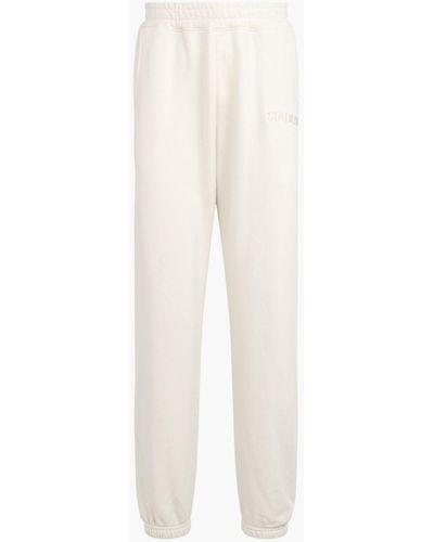 Cream Track pants and sweatpants for Women | Lyst