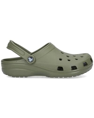 Green Crocs™ Flats for Women | Lyst