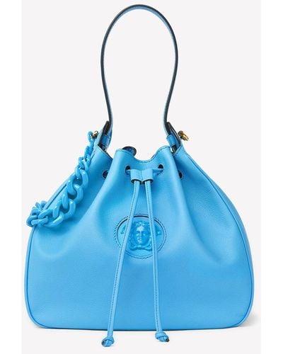 Blue Versace Bucket bags and bucket purses for Women | Lyst