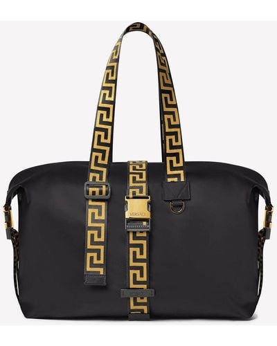 Black Versace Luggage and suitcases for Men | Lyst