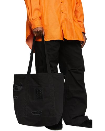 Black Raf Simons Tote bags for Men | Lyst