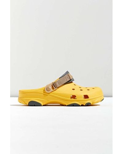 Yellow Crocs™ Slip-on shoes for Men | Lyst