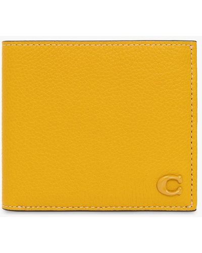 Yellow COACH Wallets and cardholders for Women | Lyst