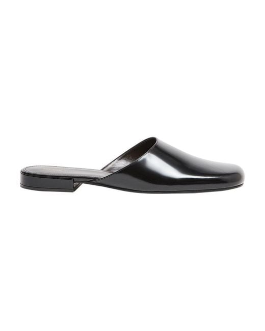 The Row Penelope Mules in Black | Lyst