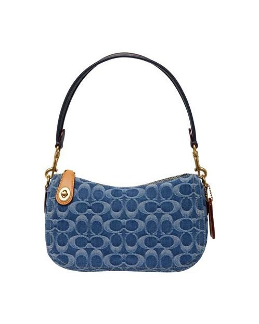 COACH Washed Denim Signature Swinger Bag in Blue | Lyst