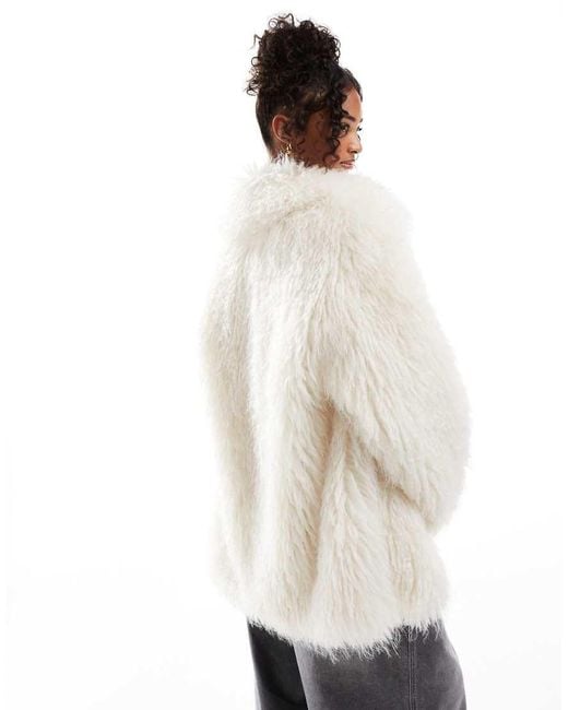 Bershka Longline Faux Fur Coat in Natural | Lyst UK