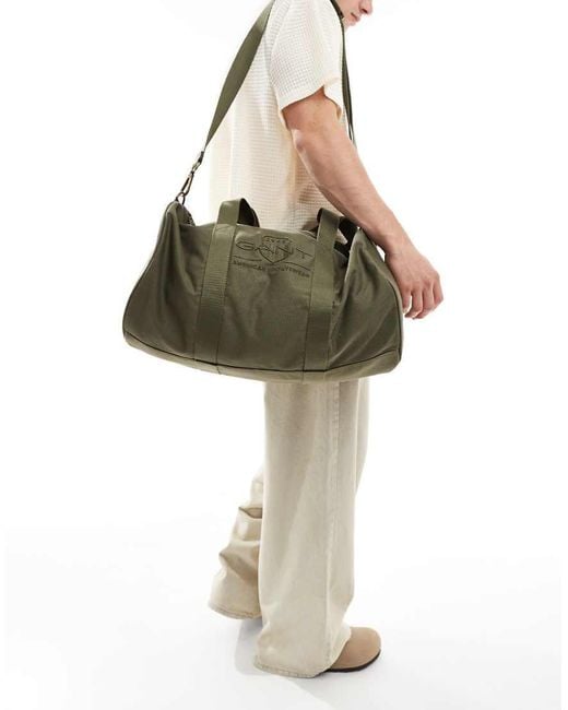 GANT Tonal Shield Logo Duffle Bag in Green for Men | Lyst UK