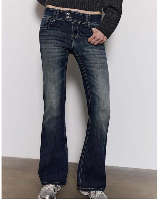 Stradivarius Embroidered Pocket Bell Bottom Jeans in Blue | Lyst UK
