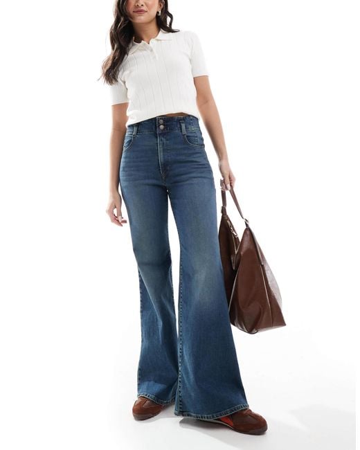 Levi's Ribcage Bells High Rise Flare Jeans With Corset Detail in Blue | Lyst