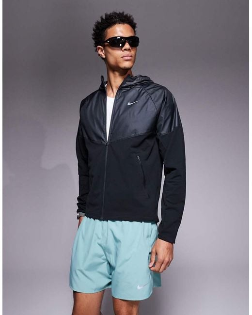 Nike Miler Winterised Jacket in Blue for Men | Lyst UK