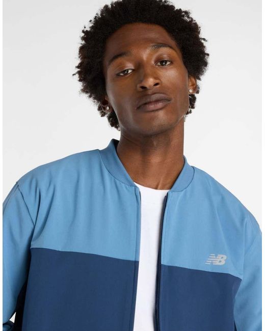 New Balance Stretch Bomber Jacket in Blue for Men | Lyst UK