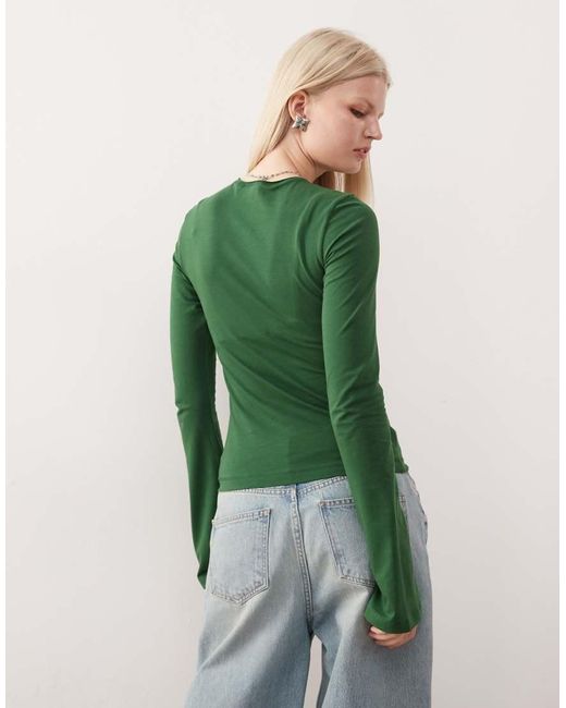 Weekday Flare Long Sleeve Top in Green | Lyst UK