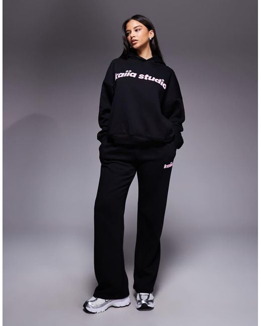 Kaiia Studio Star Logo Oversized Hoodie in Blue | Lyst UK