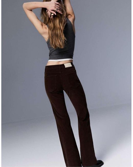 Stradivarius D74 Corduroy Bell Bottom Trousers in Black | Lyst UK