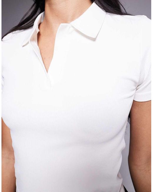 4505 Seamless Rib Short Sleeve Active Polo in White | Lyst UK