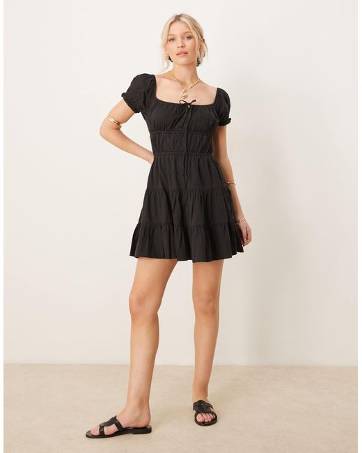 ASOS Soft Denim Smock Tiered Mini Dress With Tie Detail in Black | Lyst