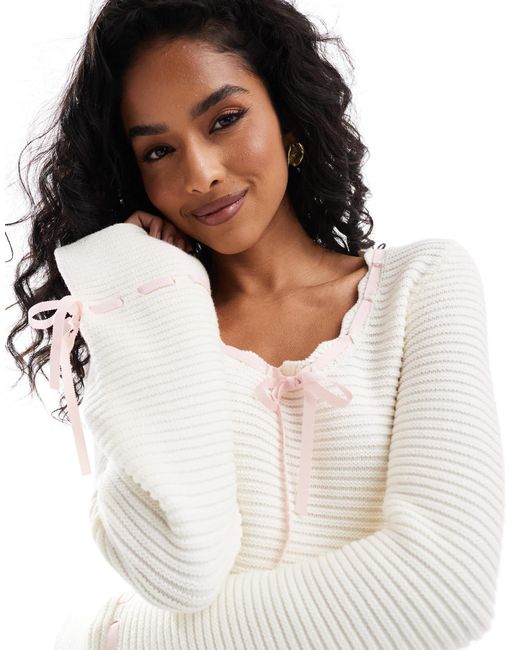 The Frolic X Bella Stovey Exclusive Knitted Scallop Hem Ribbon Detail Mini Jumper Dress in White ...