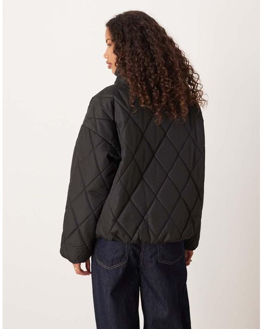 Vila High Neck Quilted Jacket With Tie Details in Black | Lyst UK