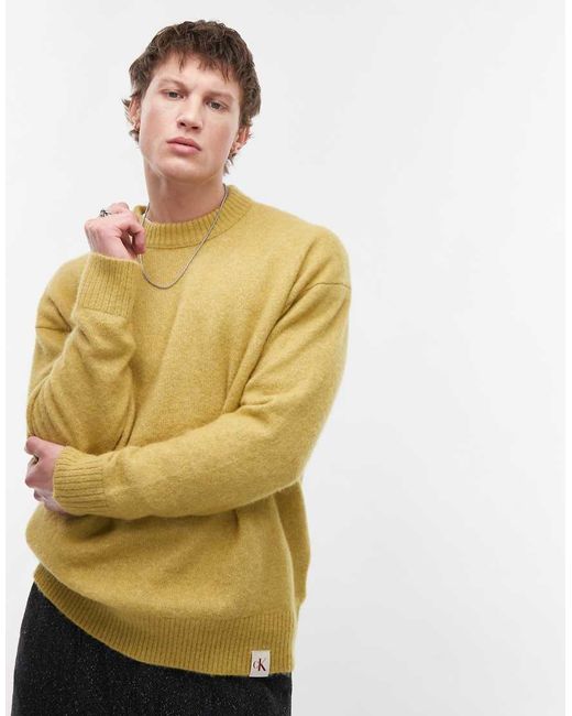 Calvin klein yellow jumper store