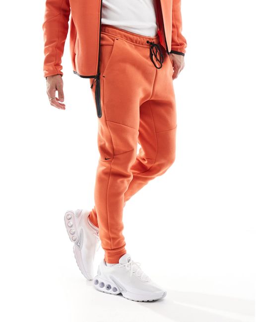 Nike Tech Fleece Cuffed Sweatpants in Red for Men | Lyst