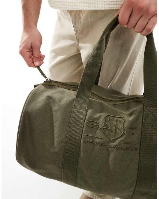GANT Tonal Shield Logo Duffle Bag in Green for Men | Lyst UK