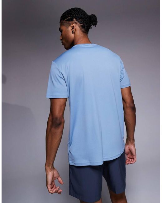 PUMA Tad Essential Poly Texture Training T-Shirt in Blue for Men | Lyst UK