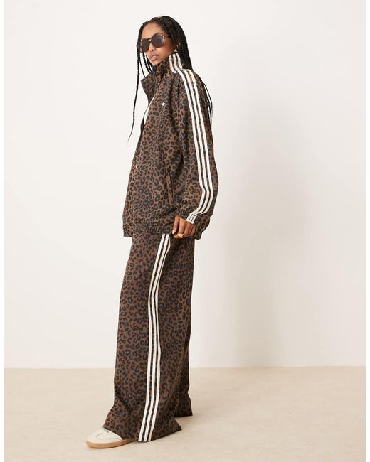 adidas Originals Leopard Firebird Oversized Track Pants in Natural ...