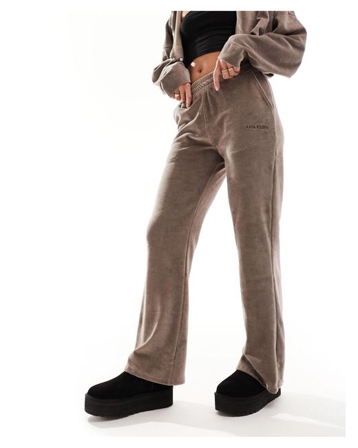 Kaiia Studio Logo Towelling Flared Trackies in Brown | Lyst
