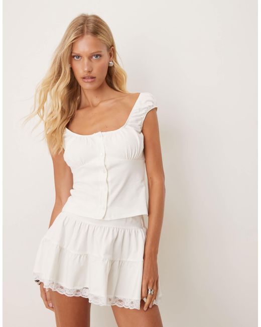 ASOS Tiered Flippy Mini Skirt With Lace Trim in Natural | Lyst