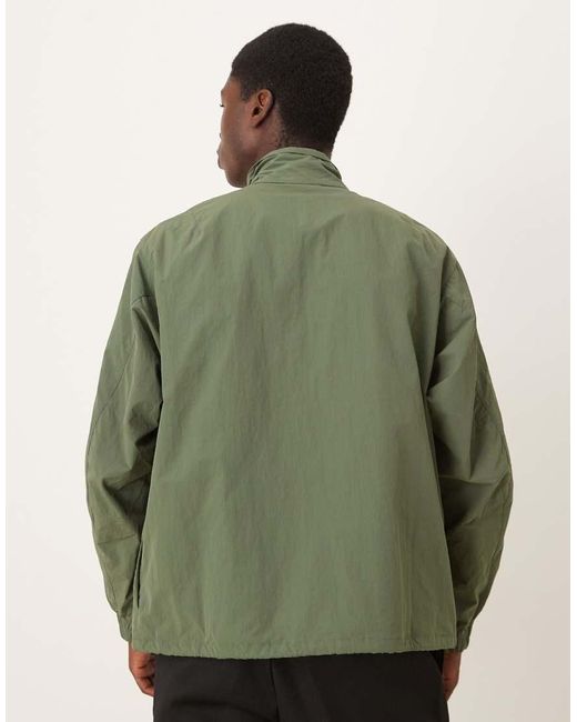 Barbour Short Showerproof Jacket in Green for Men | Lyst UK