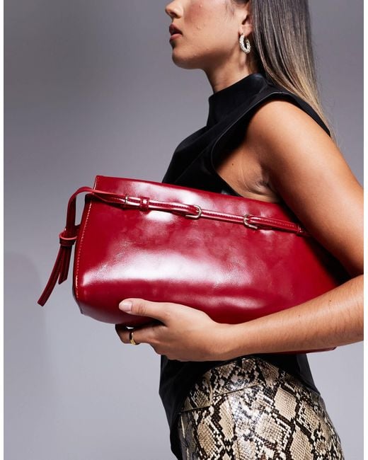 ASOS Clutch Bag With Skinny Buckle Strap Detail in Red | Lyst