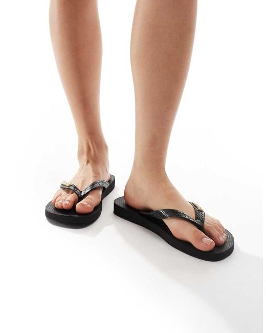 Havaianas Classic Metal Logo Flip Flops in White | Lyst UK