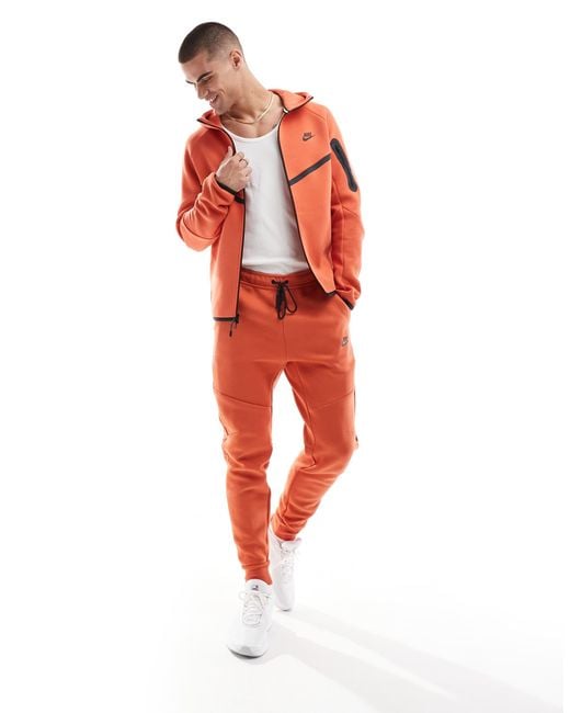 Nike Tech Fleece Cuffed Sweatpants in Red for Men | Lyst