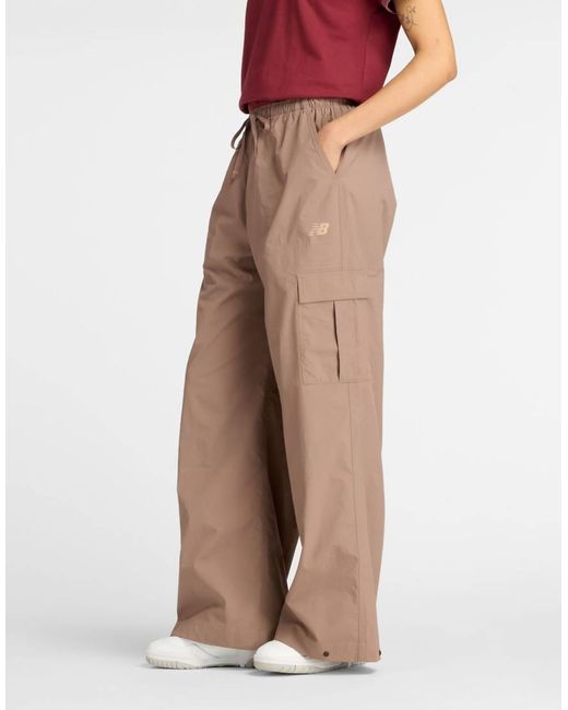 New Balance Woven Cargo Pant in Natural | Lyst UK