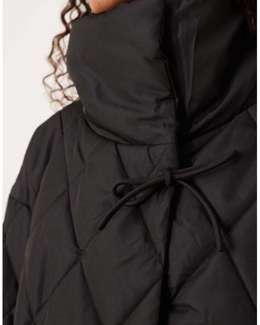 Vila High Neck Quilted Jacket With Tie Details in Black | Lyst UK
