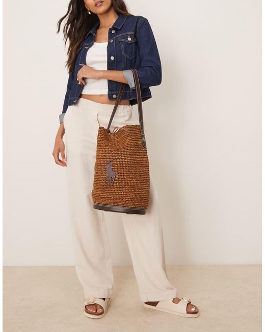 Polo Ralph Lauren Bucket Tas Van Raffia Met Logo in het Blauw | Lyst NL