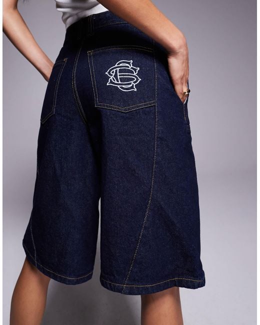 Courtside Panel Detail Denim Jorts With Back Pocket Logo Embroidery in ...