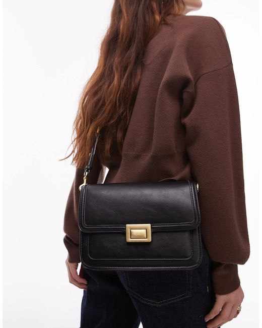 Mango Cross Body Gold Lock Bag in Brown | Lyst