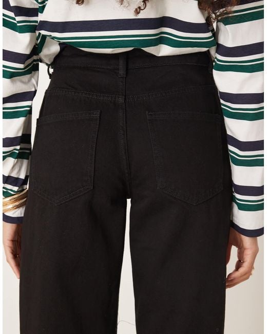 ASOS Boyfriend Fit Denim Jeans With Rips in Black | Lyst