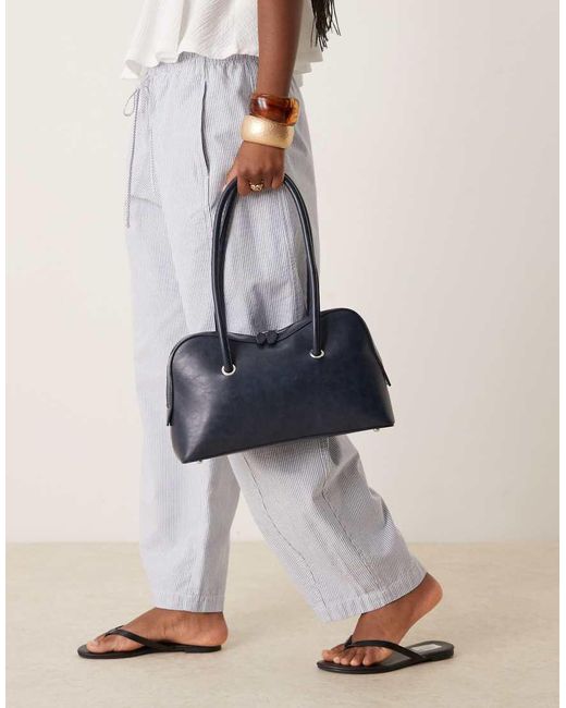 ASOS Bowler Bag With Curve Detail in Blue | Lyst UK