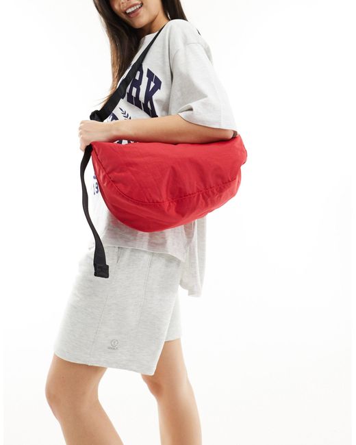 BAGGU Medium Nylon Crescent Crossbody Bag in Red | Lyst UK