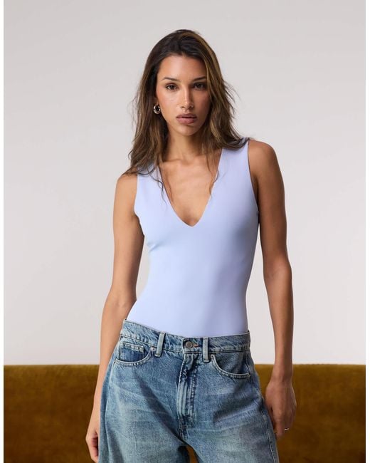 GOOD AMERICAN Sculpting Deep V Tank Bodysuit in Blue | Lyst