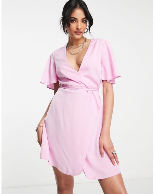 Asos Satin Bias Mini Wrap Dress With Fluted Sleeve In Purple Lyst Canada