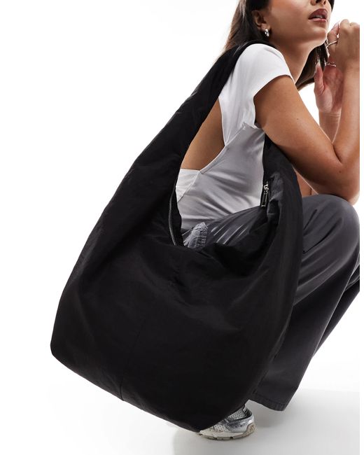 ASOS Large Slouchy Sling Tote Bag in Black | Lyst