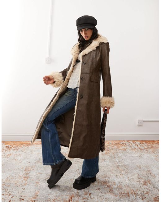 Reclaimed (vintage) Longline Leather Look Coat With Faux Fur Trims in Brown | Lyst