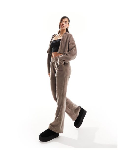 Kaiia Studio Logo Towelling Flared Trackies in Brown | Lyst