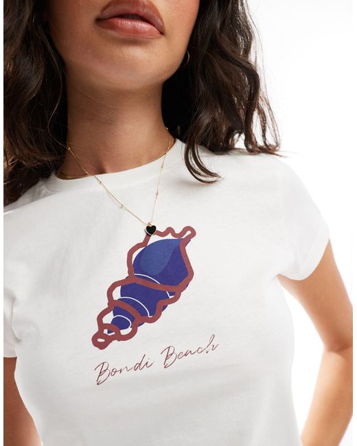 ASOS Baby Tee With Bondi Beach Shell Graphic in White | Lyst