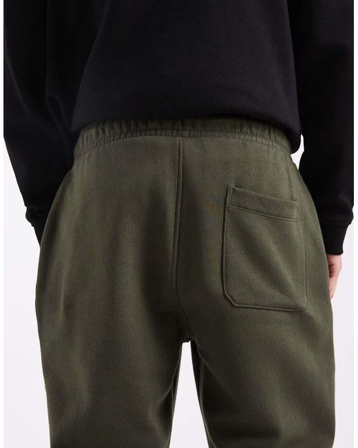 ASOS Essentials Tapered jogger in Black for Men | Lyst UK