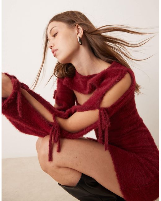 The Frolic Exclusive Fluffy Cut Out Bow Tie Sleeve Knitted Mini Dress in Red | Lyst